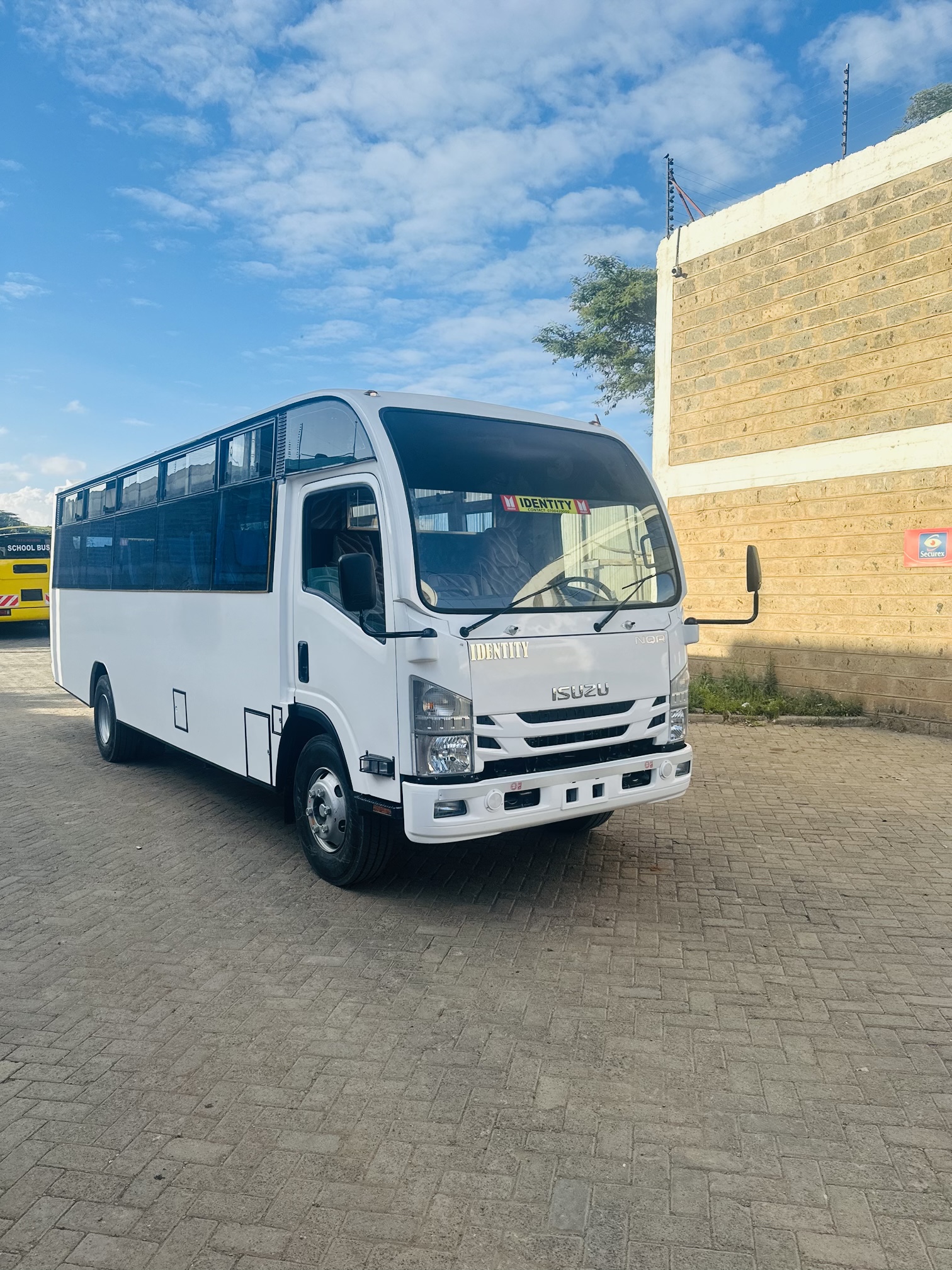 NQR 33-Seater Staff Bus - Identity Auto Fabricators Ltd
