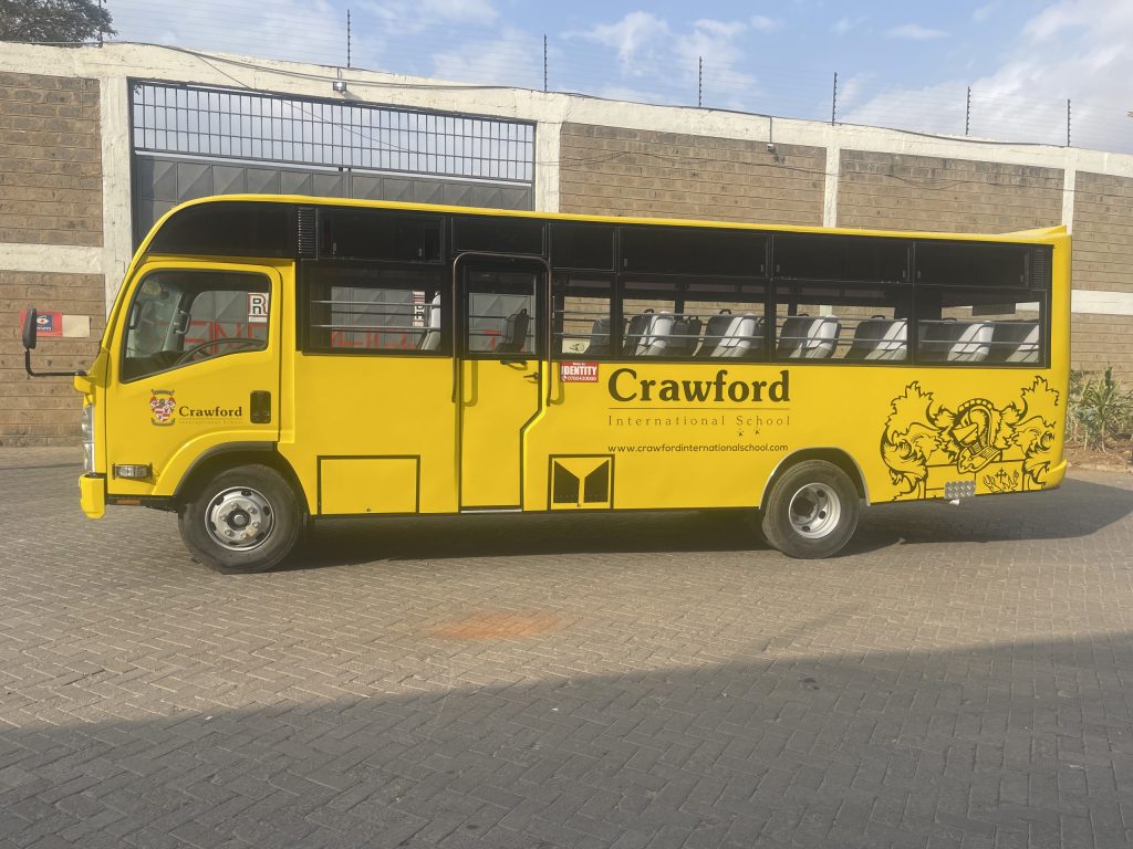 NQR 33-SEATER SCHOOL BUS - CRAWFORD - Identity Auto Fabricators Ltd